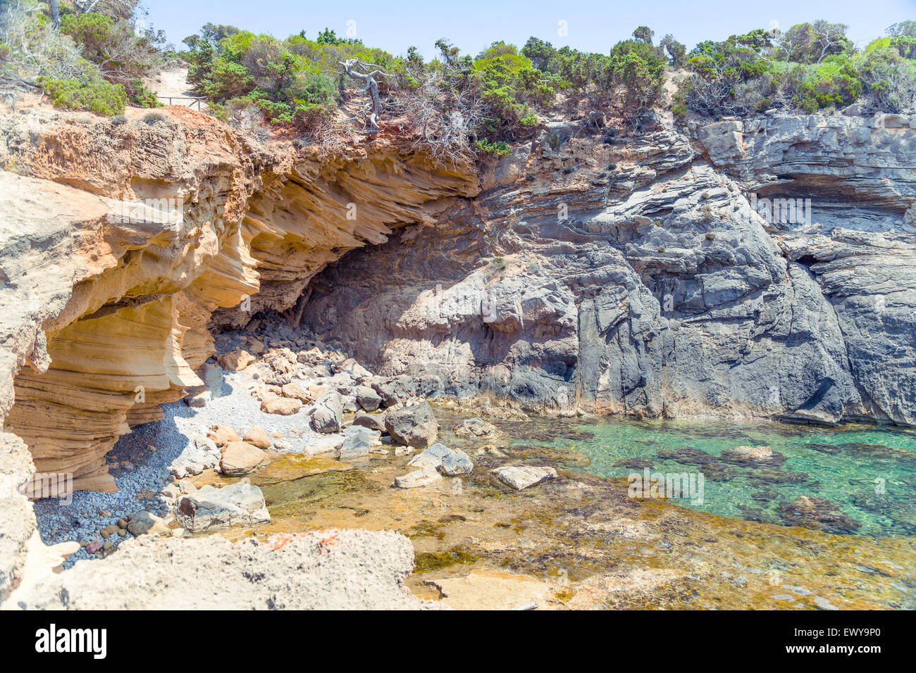 Grotto on Rocky Beach Stock Photo - Alamy