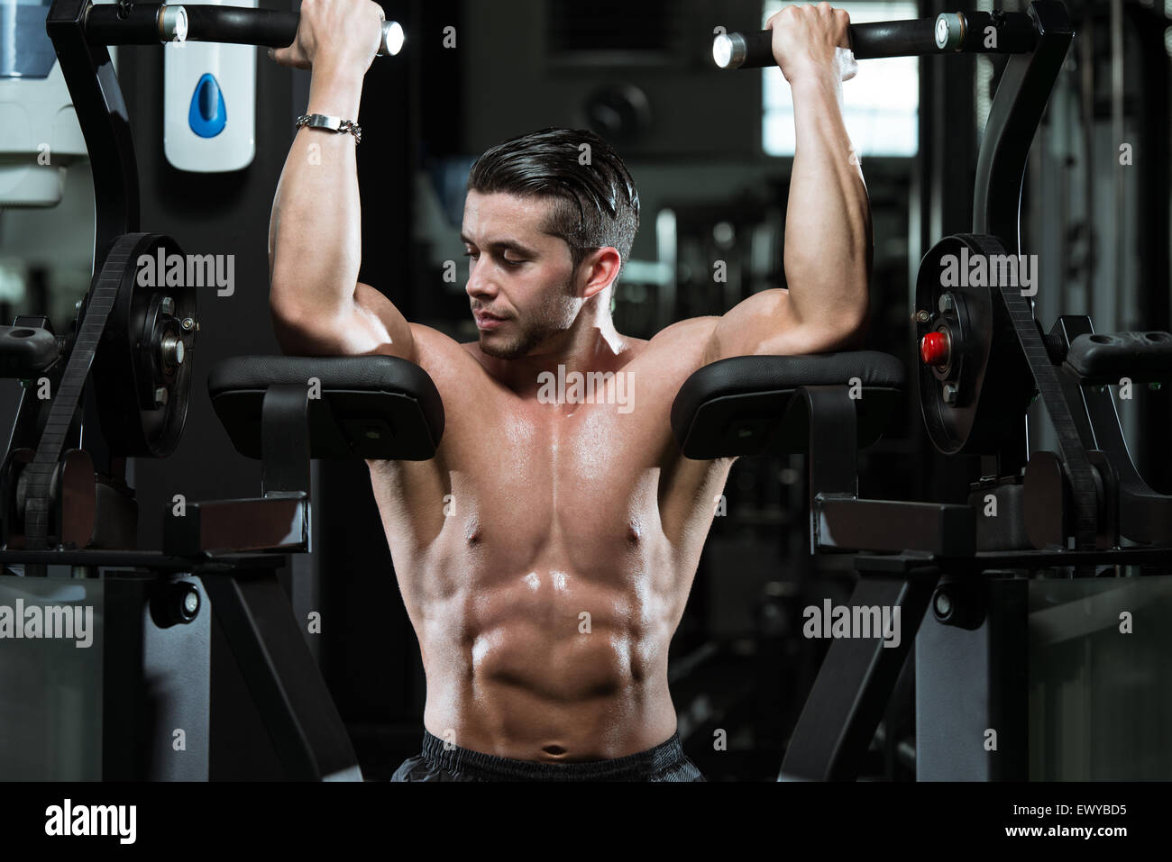 Male Bodybuilder Doing Heavy Weight Exercise For Biceps Stock Photo - Alamy