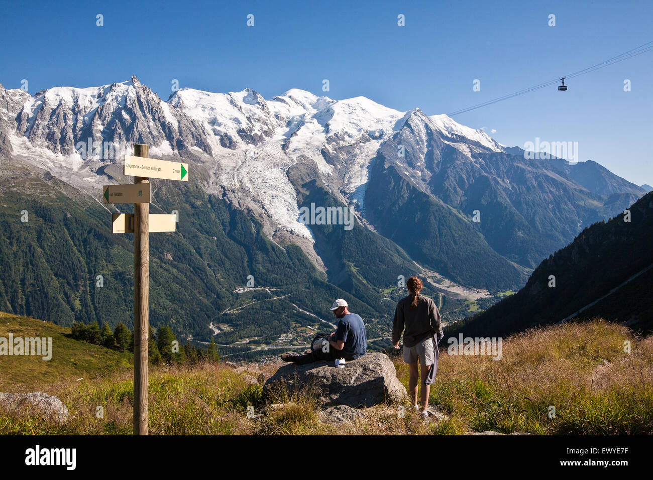 Hiking above Chamonix Mont Blanc valley, France. Mont Blanc mountain in ...