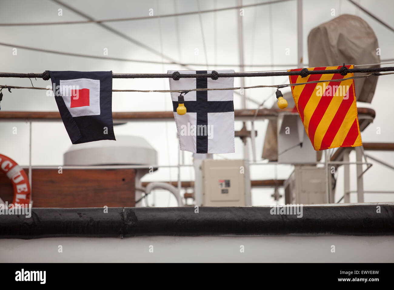 Belfast, UK. 2nd July 2015. Naval Flags hang on the side of a lifeboat ...