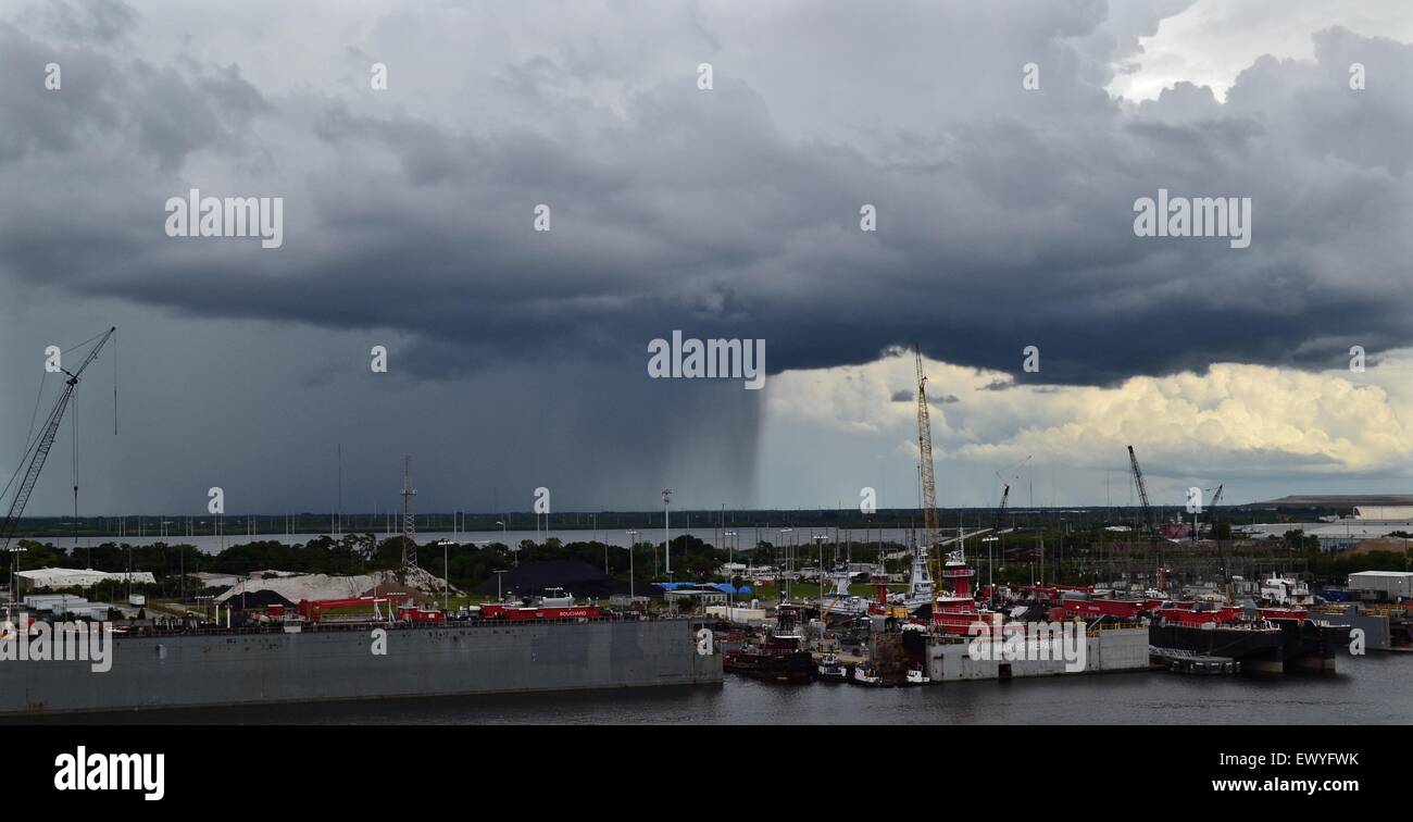 Thunderstorm approaching port Stock Photo - Alamy