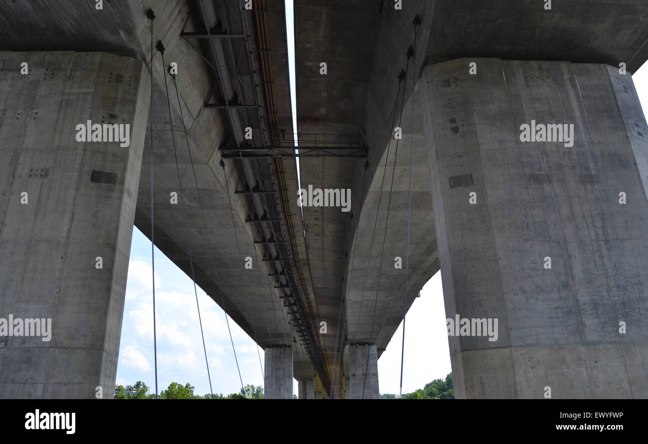 Suspension bridge underneath a highway overpass Stock Photo - Alamy
