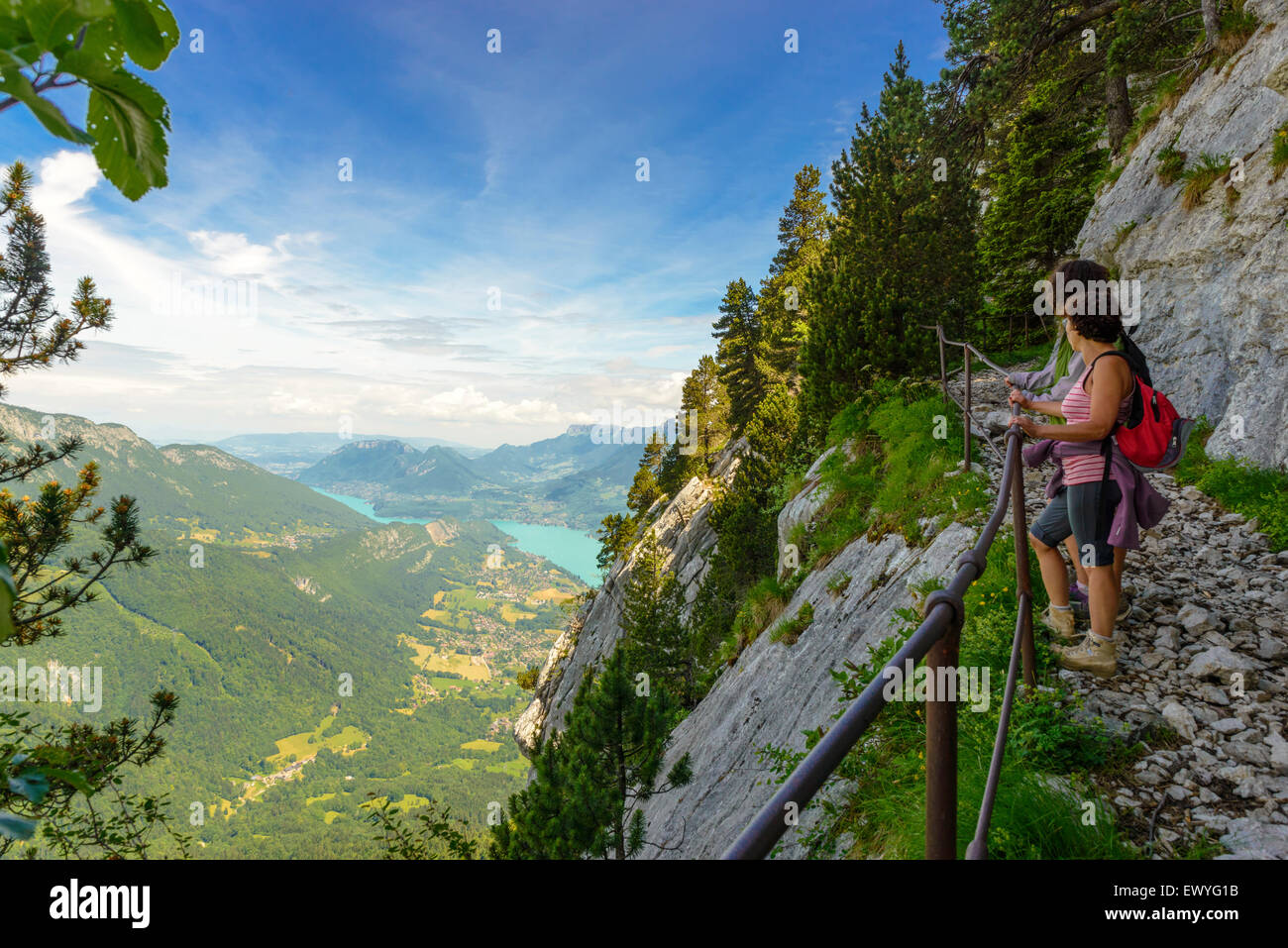 Two hikers women walking in the french mountains Stock Photo - Alamy