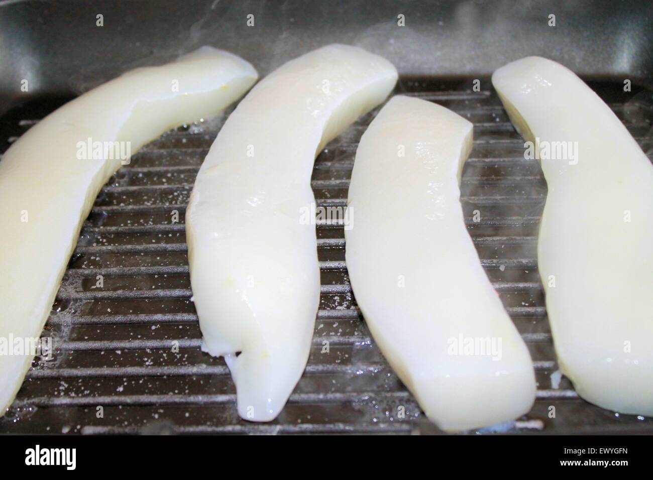 slices of grilled squid Stock Photo - Alamy
