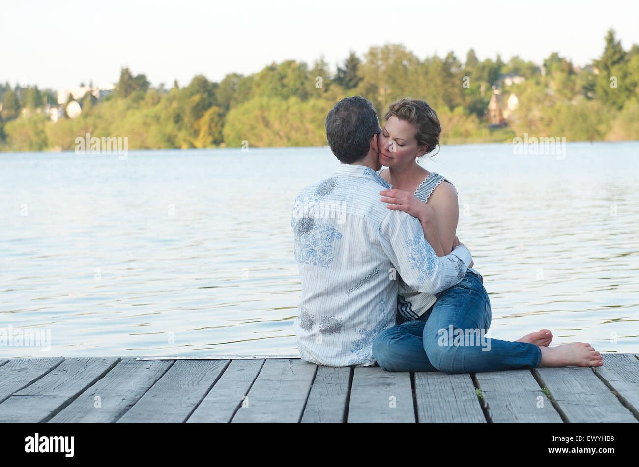Full length couple sitting on hi-res stock photography and images - Alamy
