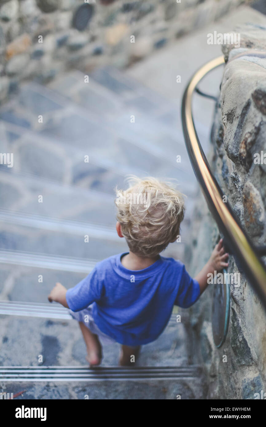 Child walking down steps hi-res stock photography and images - Alamy