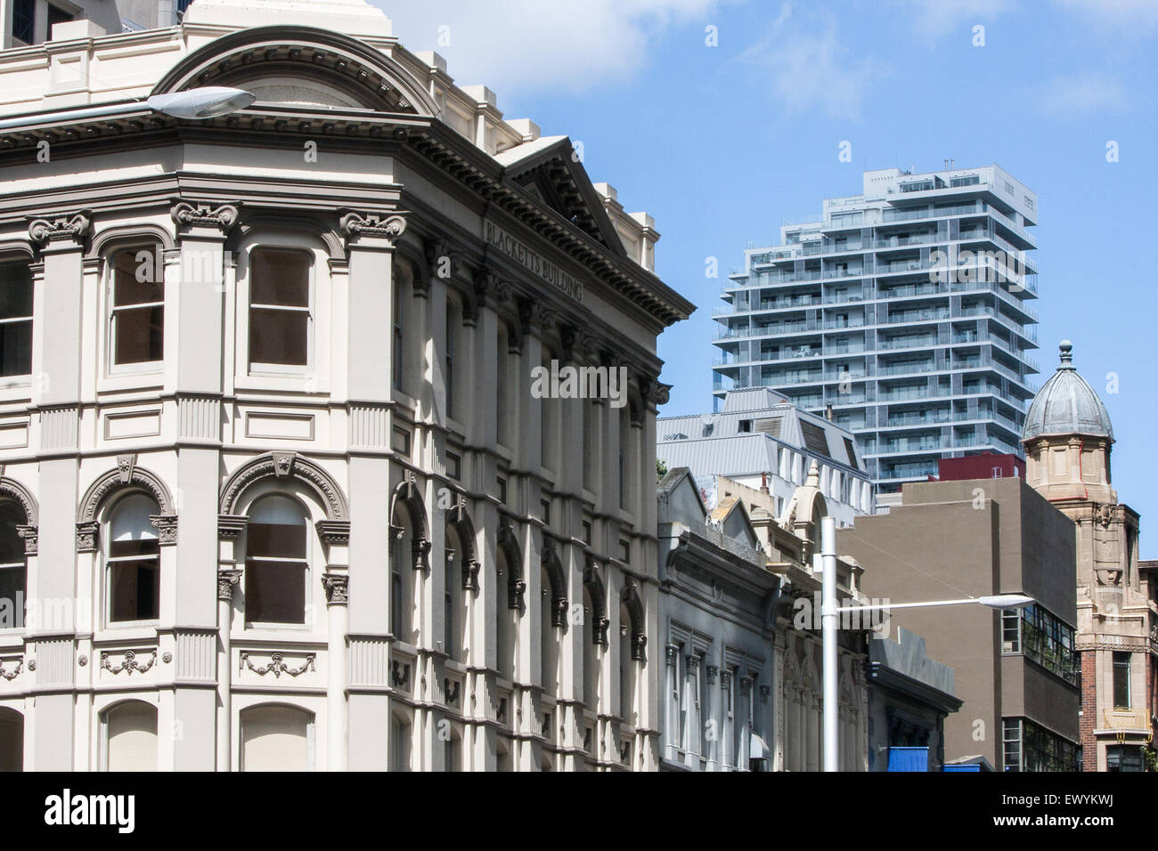 Modern tower block and colonial buildings along Queen Street.Main ...