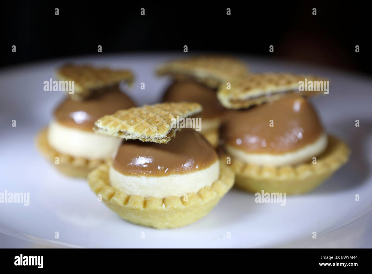 Cakes topped with stroopwafels (syrup waffles) in Gouda, the ...