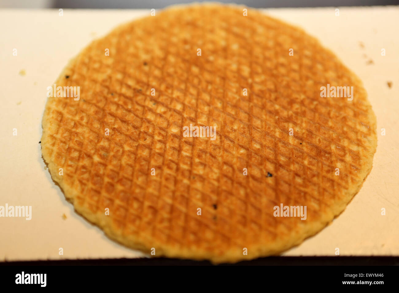 A stroopwafel (syrup waffle) being made in Gouda, the Netherlands. The ...