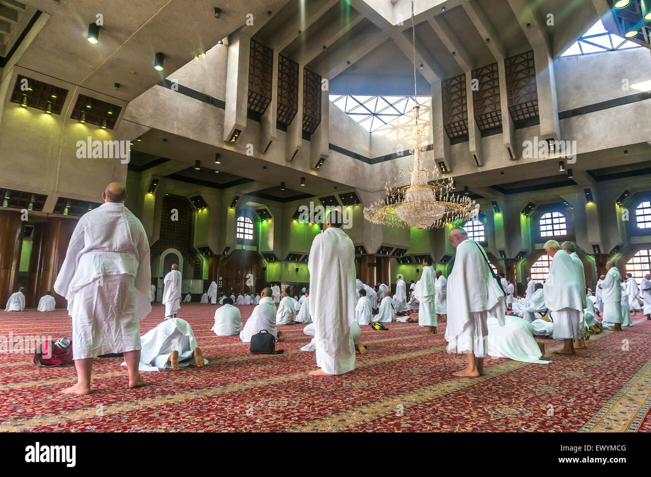 TAN’IM, SAUDI ARABIA - MAR 12 : Muslims pray inside Taneem mosque Stock ...