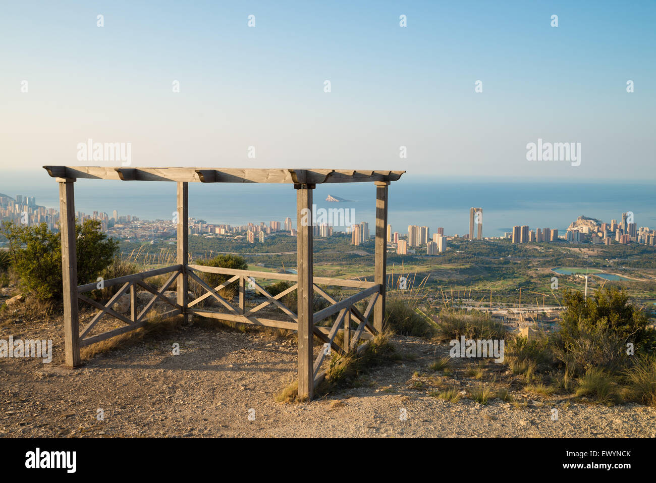 The skyline of tourist resort Benidorm seen from a hilltop viewpoint ...