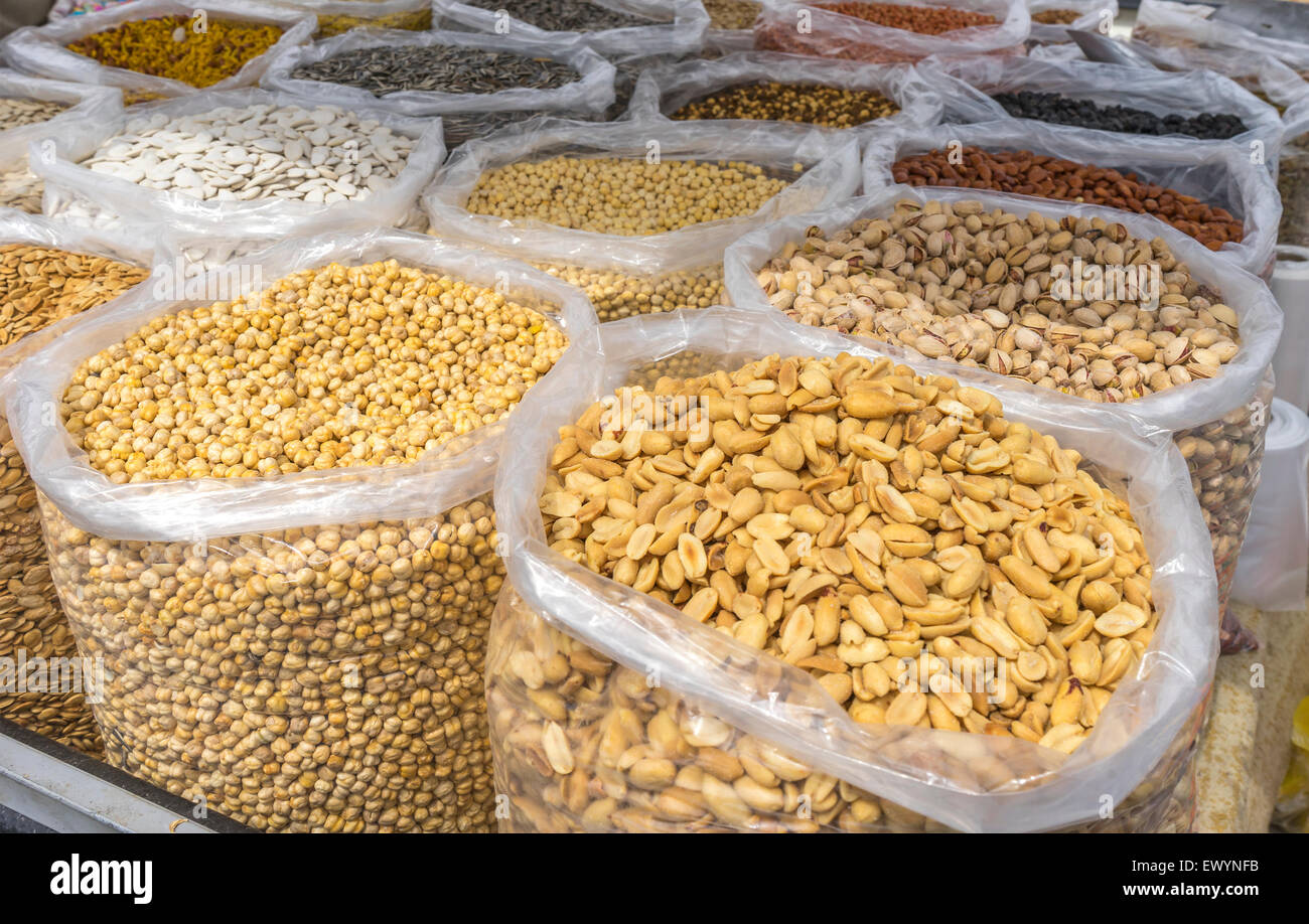 Varieties of nuts: peanuts, hazelnuts, chestnuts, walnuts, pistachio ...