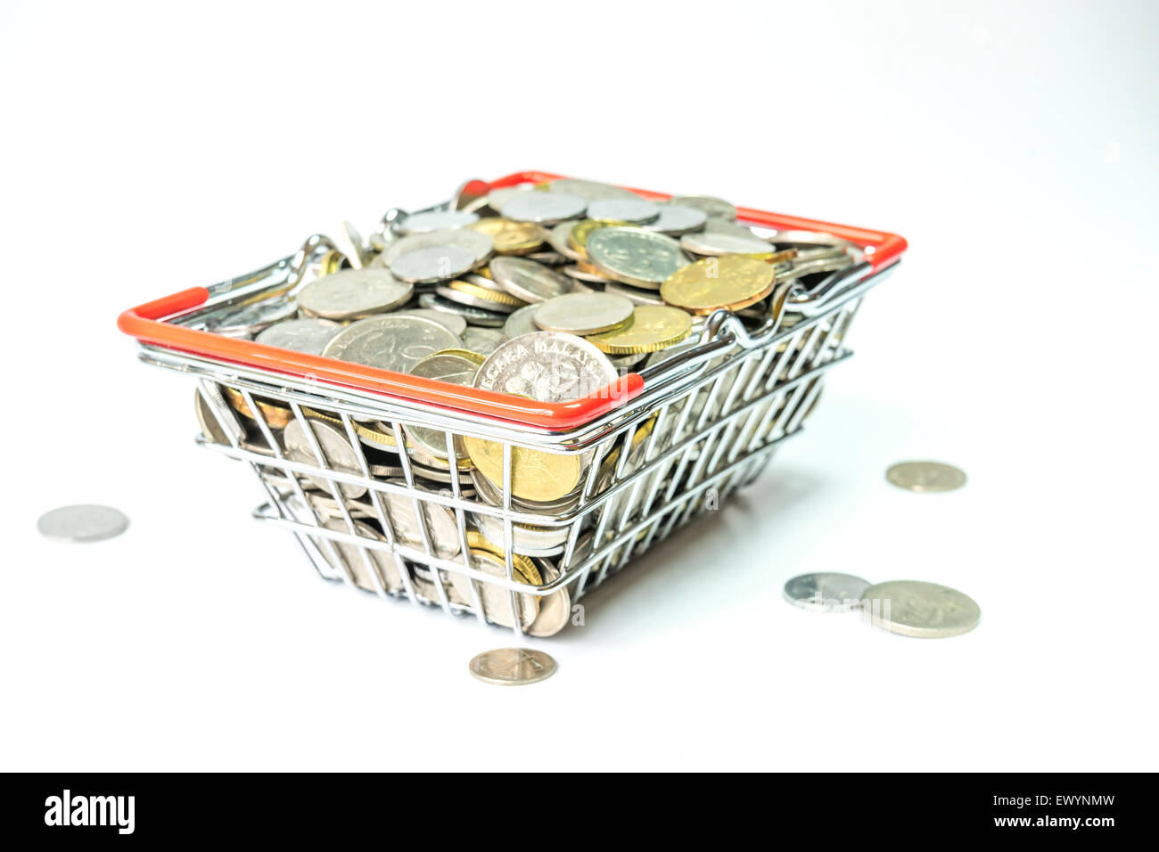 Coins inside basket Stock Photo - Alamy