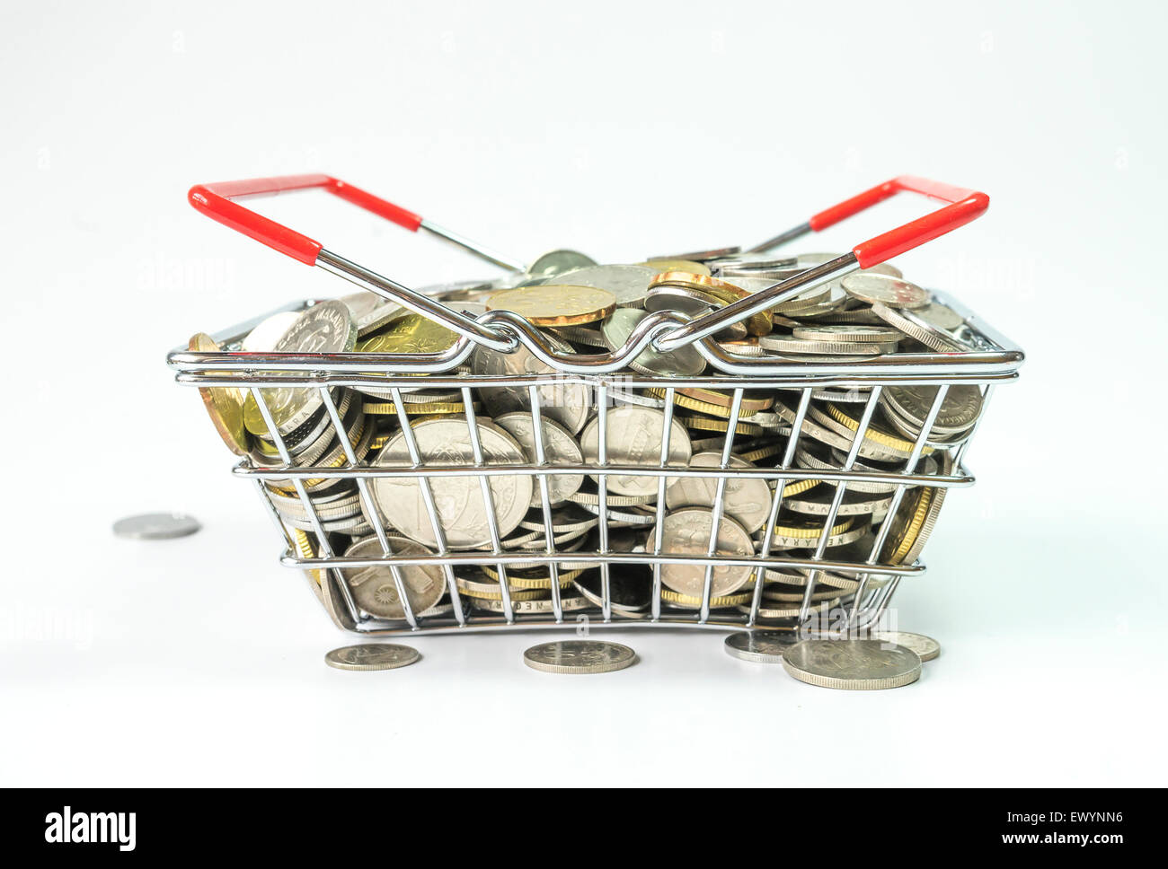 Coins inside basket Stock Photo - Alamy