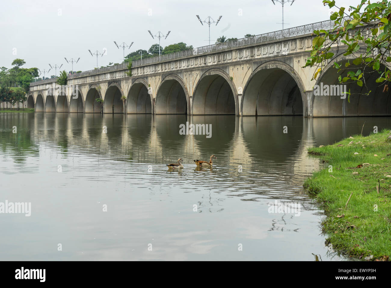 Lake with concrete bridge Stock Photo - Alamy