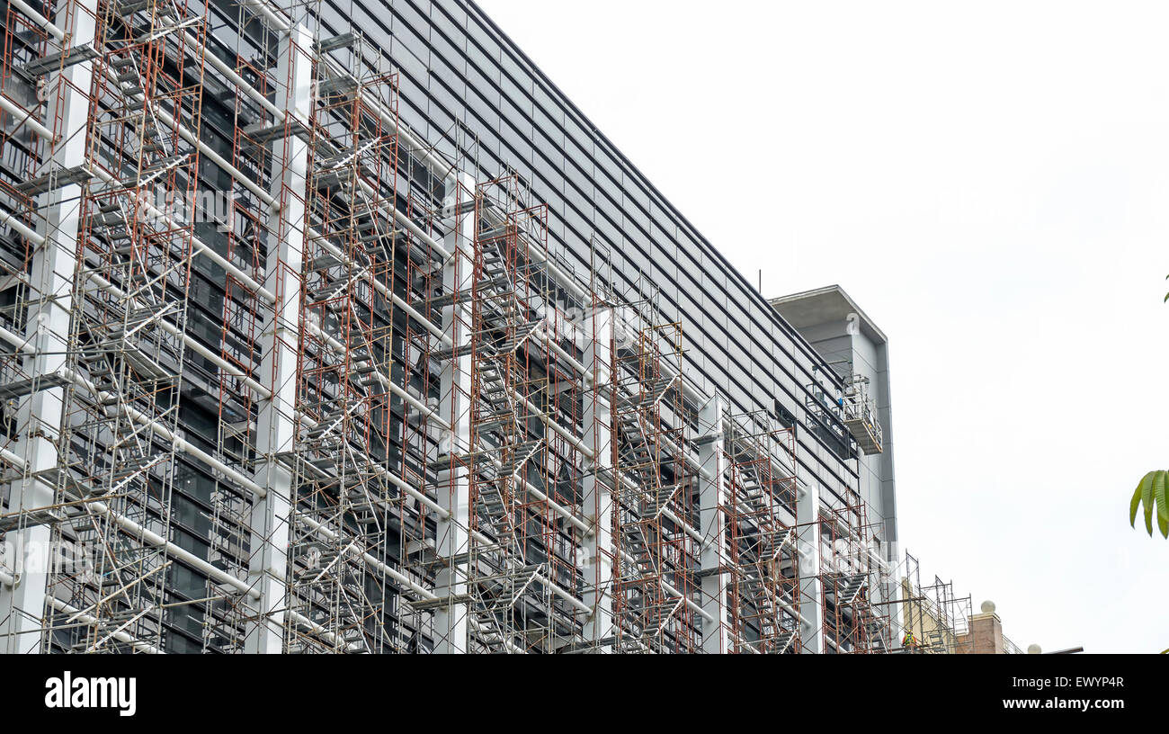 Glass building under construction stage Stock Photo - Alamy
