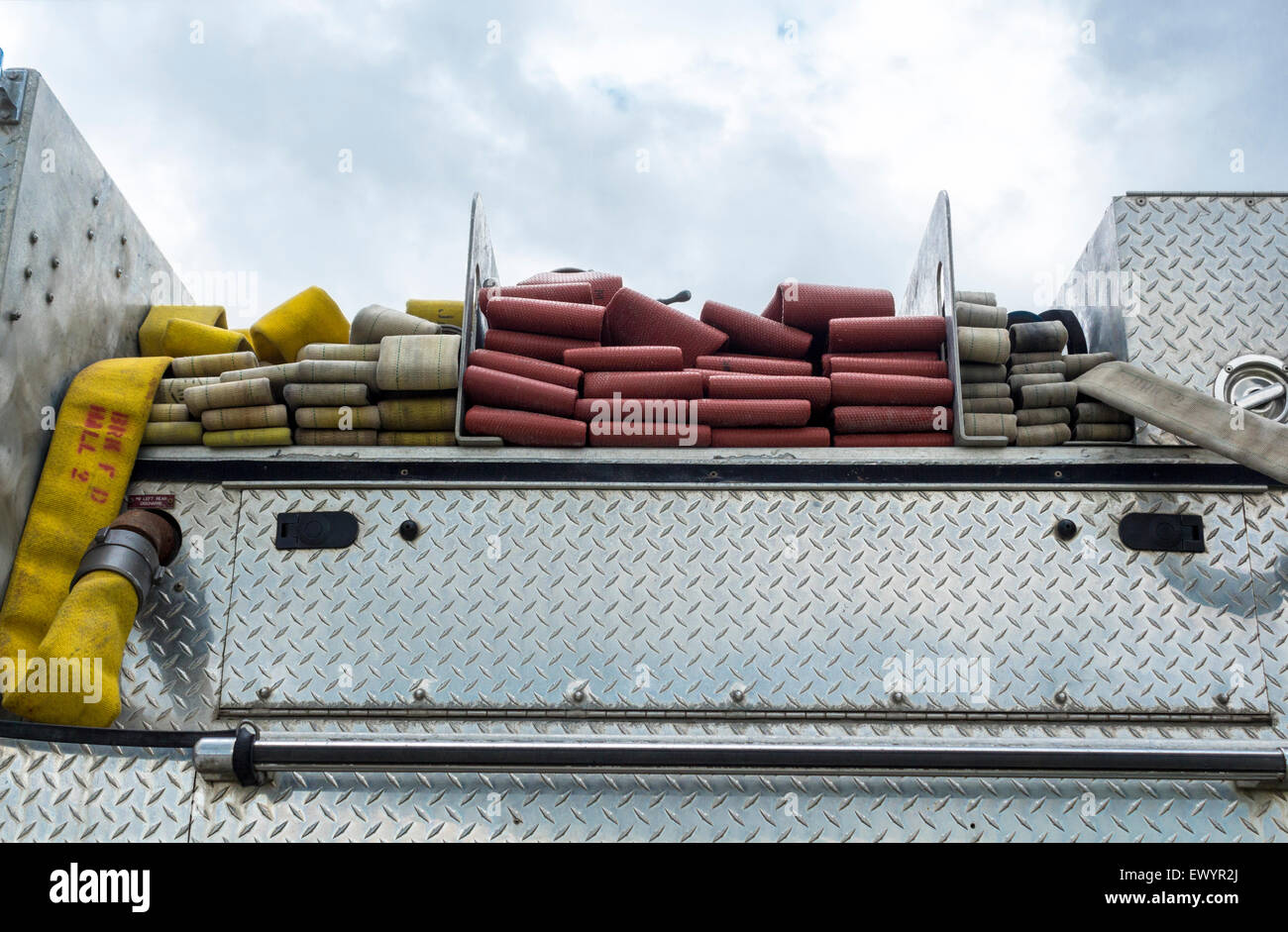 Fire hoses at the top of a fire truck Stock Photo - Alamy
