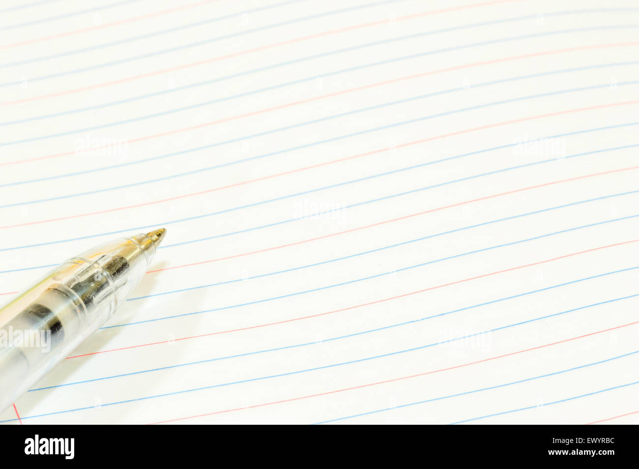 Pen on white paper Stock Photo - Alamy