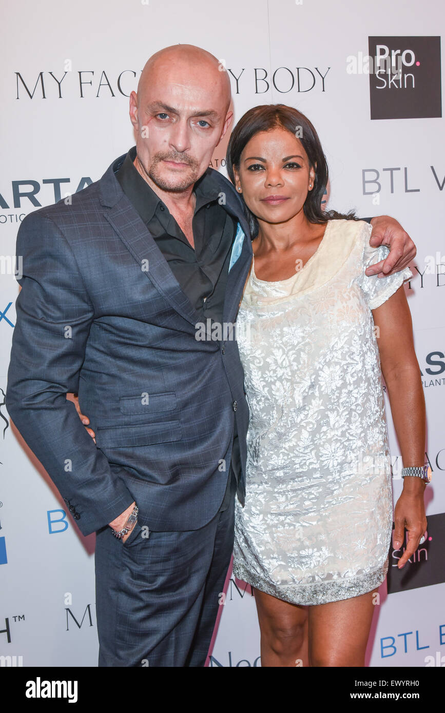 London,UK, 2nd July 2015 : Actor Sean Cronin of Impossible 5 and girlfriend Nadia Alami attends ...