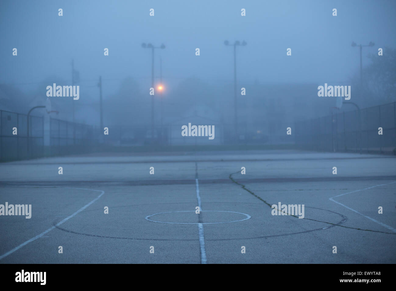 A foggy urban landscape at dusk Stock Photo - Alamy