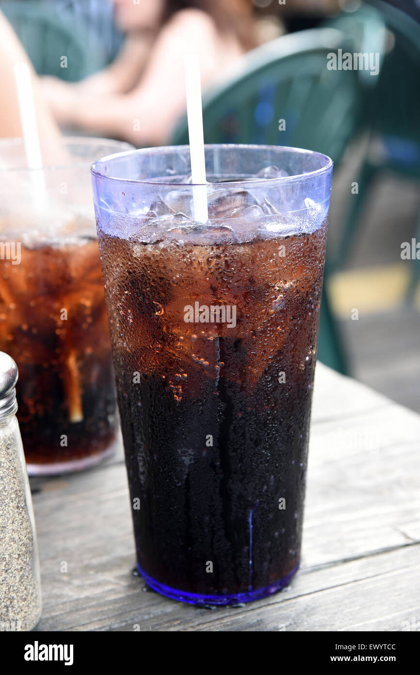 Cup of Soda with ice and straw Stock Photo - Alamy