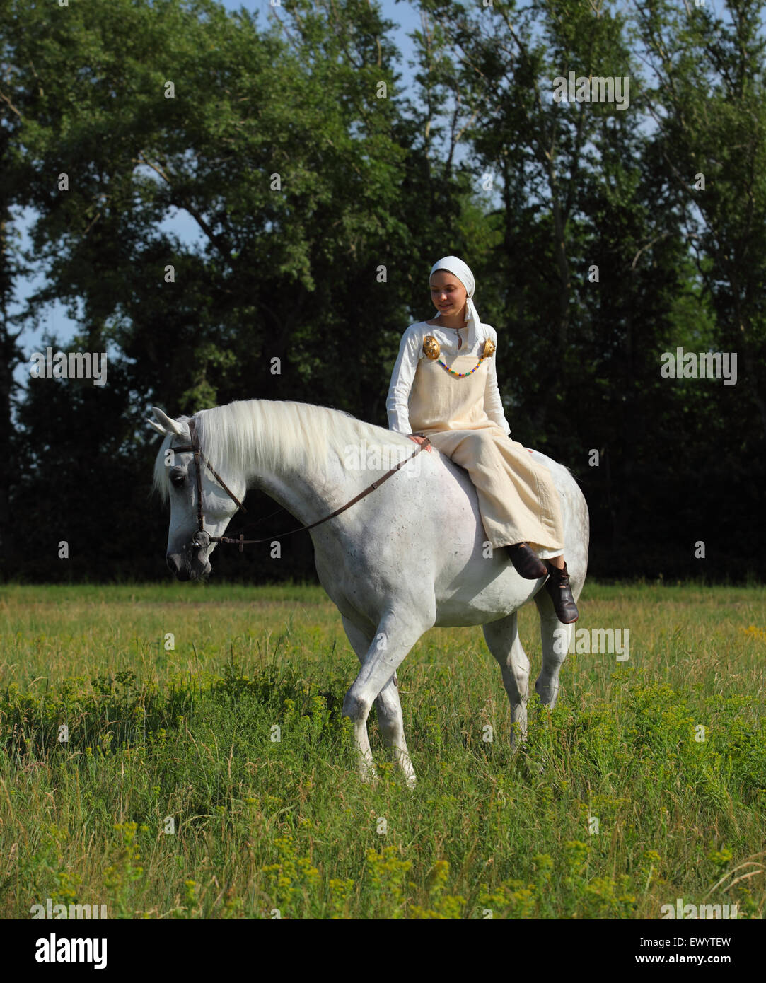 Beautiful blond female viking riding bareback horse at the annual ...