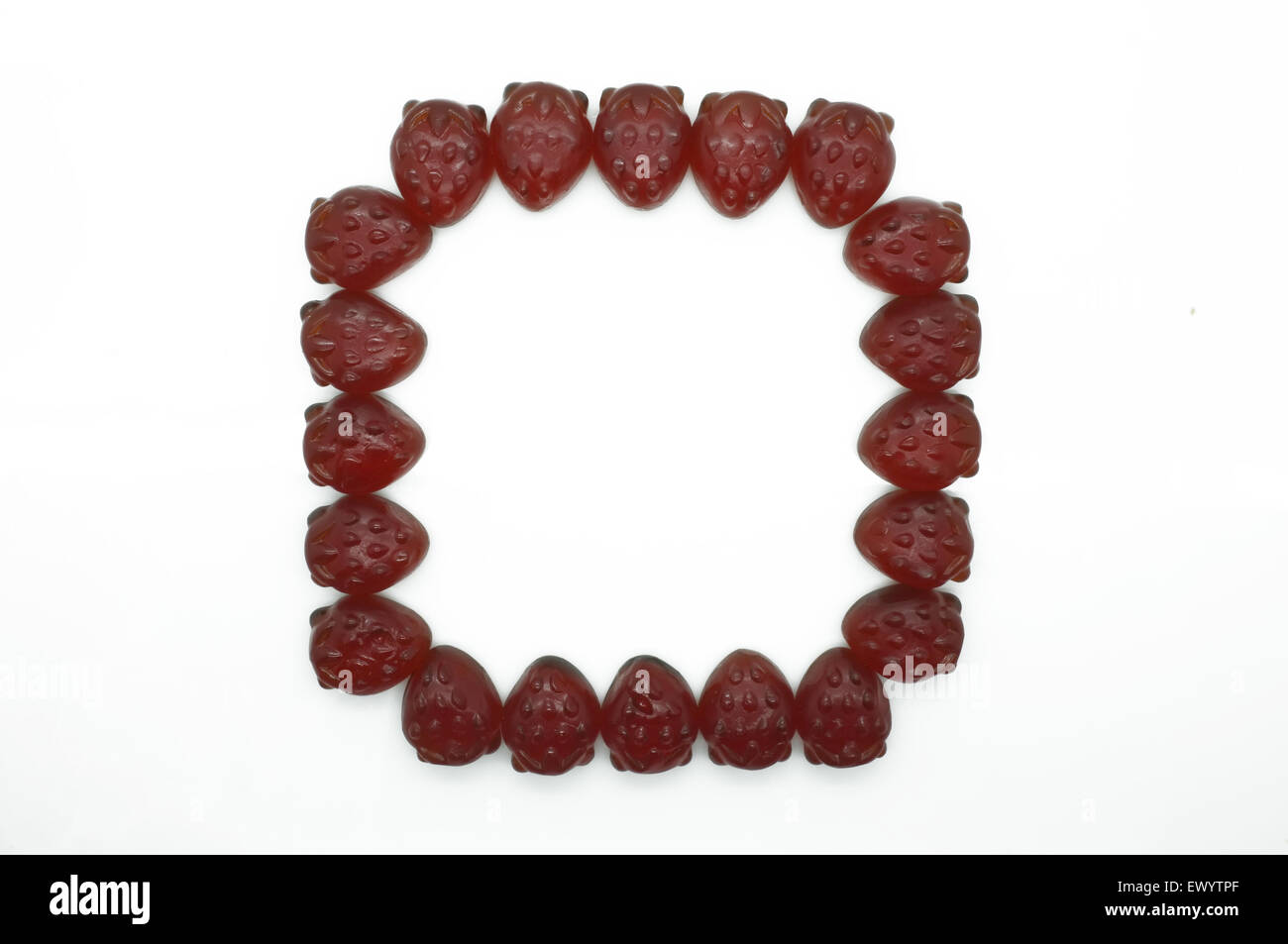 Frame, border of gummy red strawberry jelly Stock Photo - Alamy