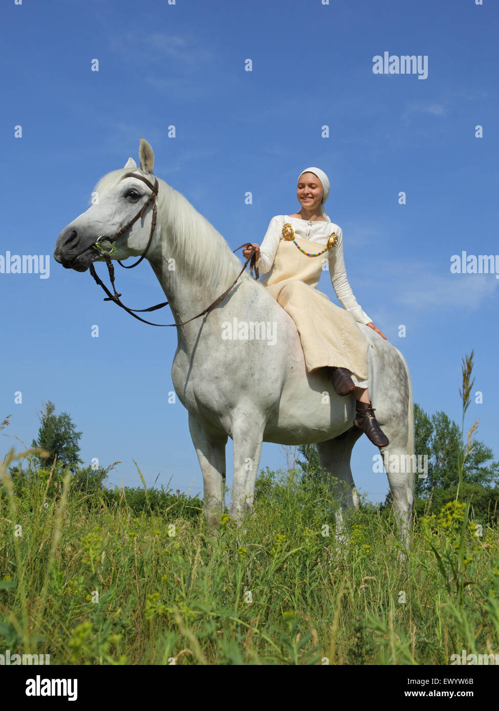 Beautiful blond female viking riding bareback horse at the annual ...