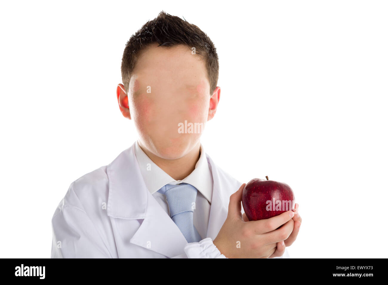 A boy without face with medical white coat is showing a juicy and tasty ...