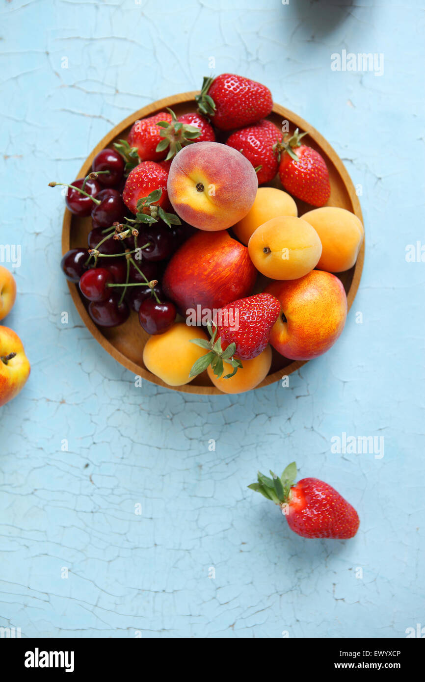 assorted summer fruits on plate Stock Photo - Alamy