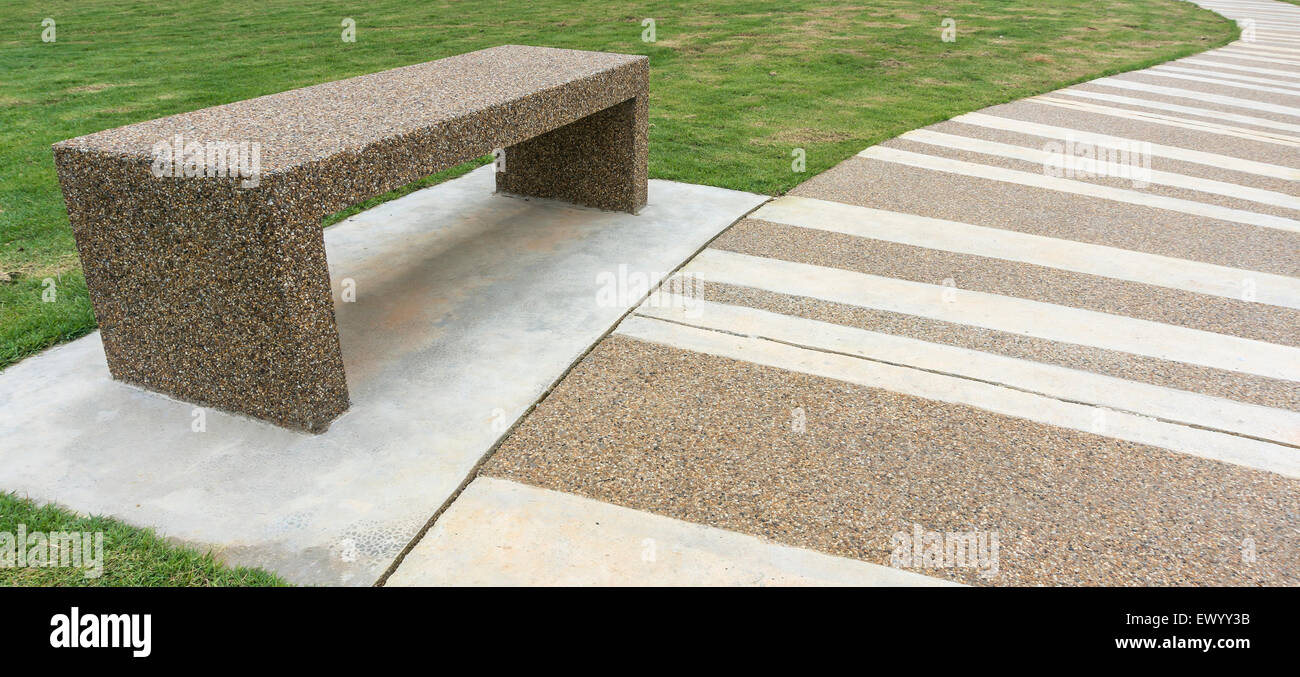 Bench at pedestrian walkway Stock Photo - Alamy