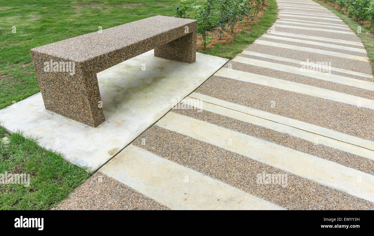 Brench at pedestrian walkway Stock Photo - Alamy