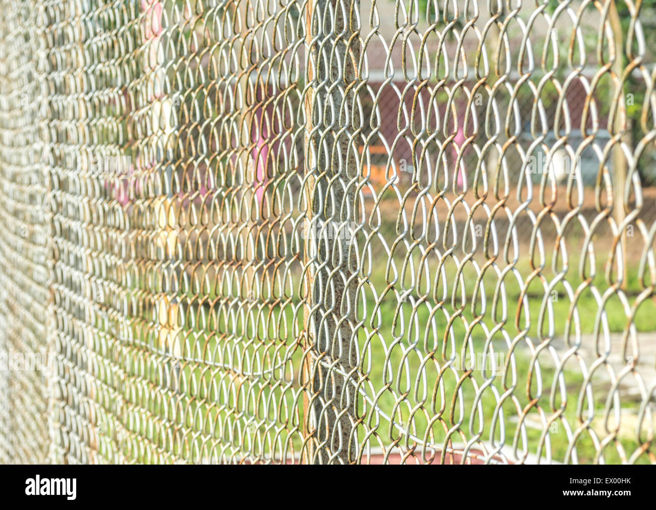 Iron chain fence with blurred background Stock Photo - Alamy
