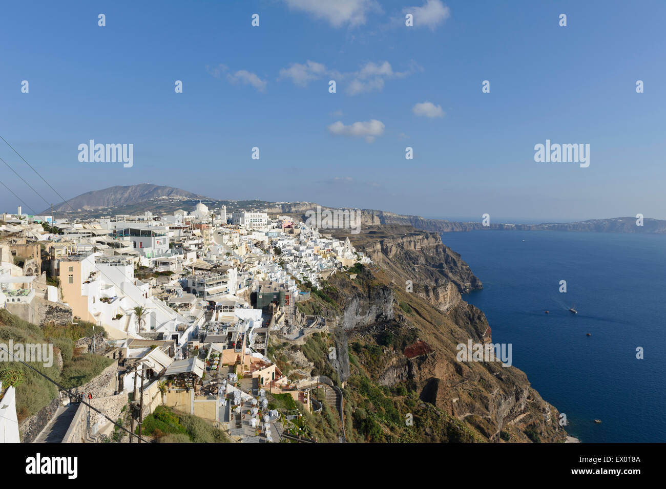 A panoramic view of the Capital Fira with all the white buildings on ...