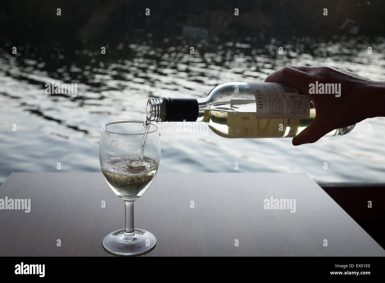 Pouring White Wine Stock Photo - Alamy