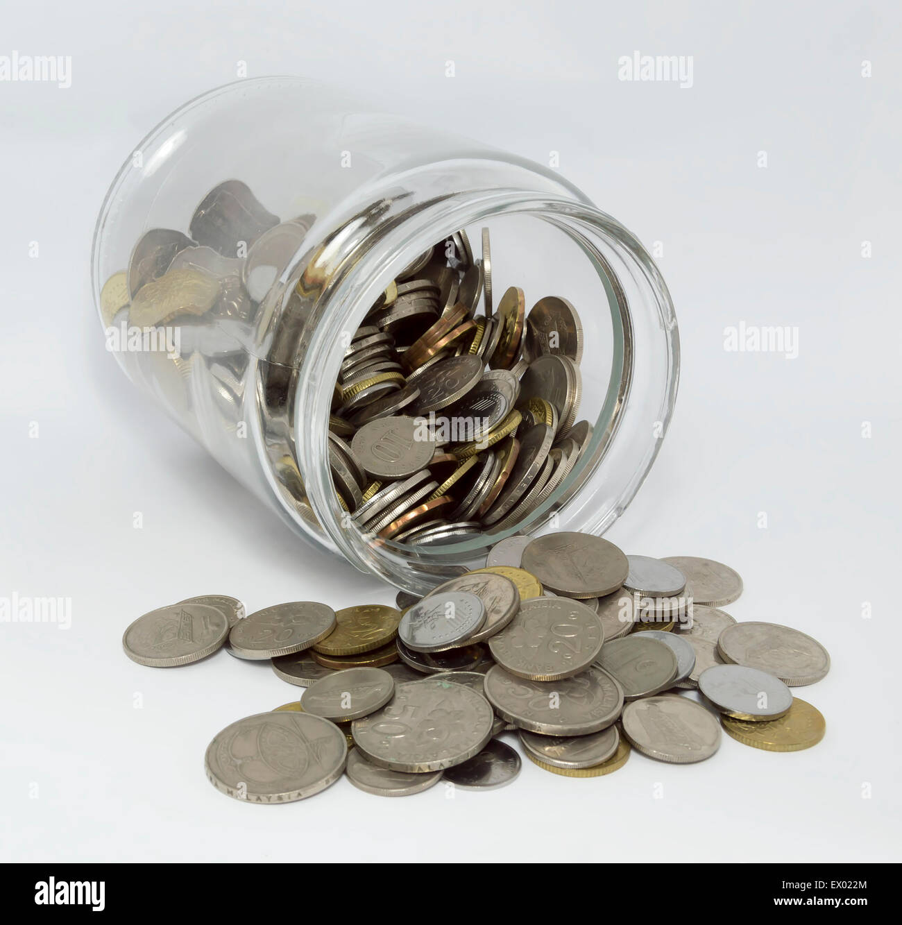 coins inside jar glass Stock Photo - Alamy