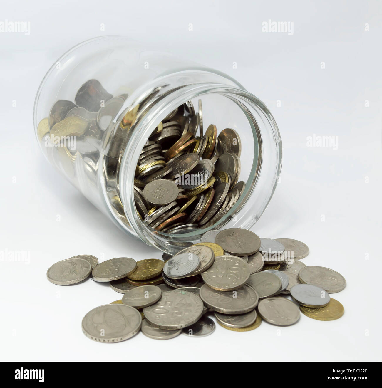 coins inside jar glass Stock Photo - Alamy