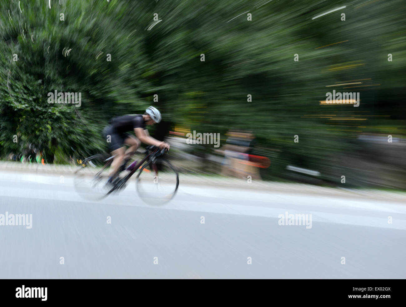 Fast motion concept with Cyclists on the road Stock Photo - Alamy
