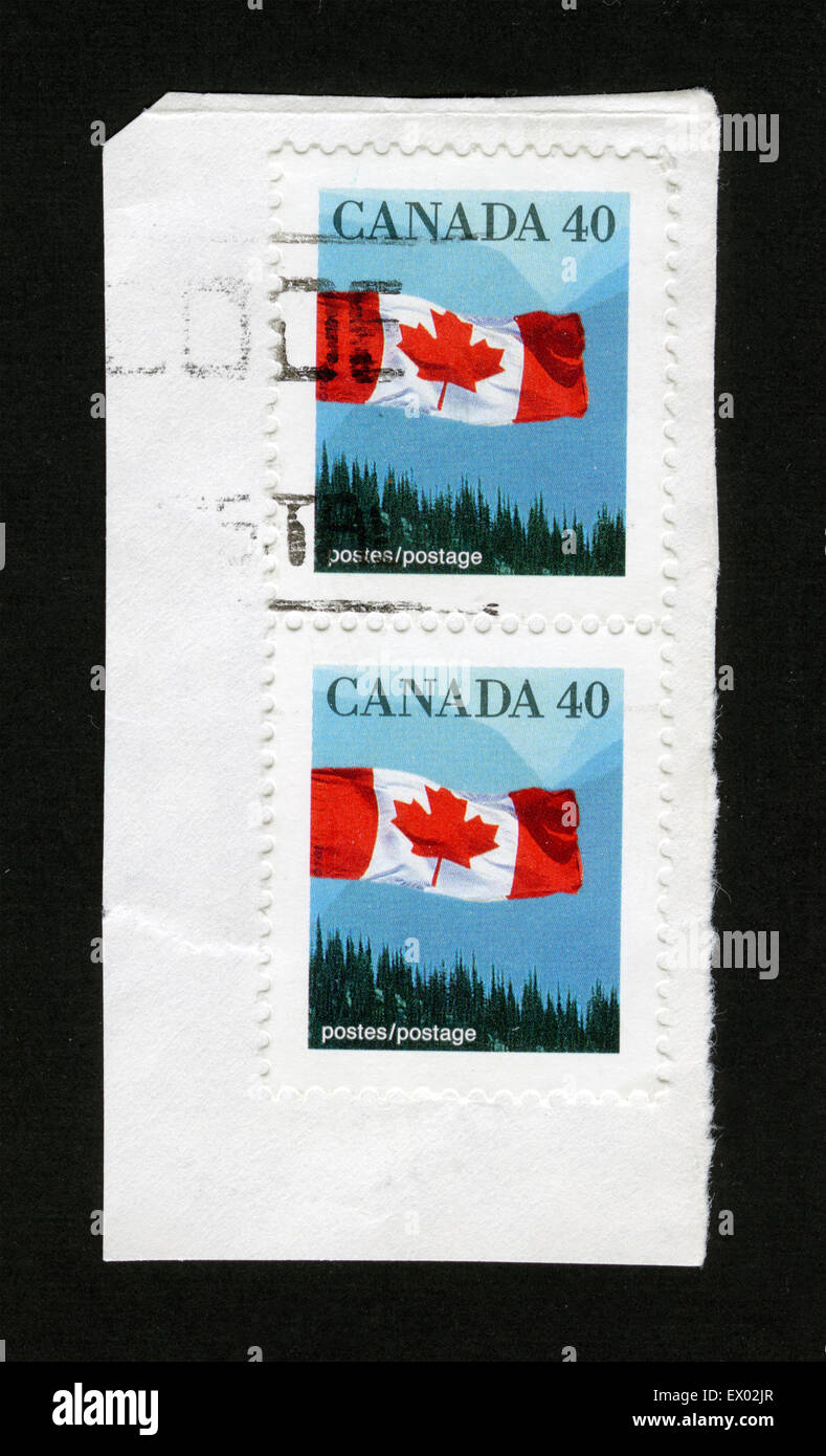 CANADA - CIRCA 1990: Postage stamp printed in Canada, shows Flag and ...