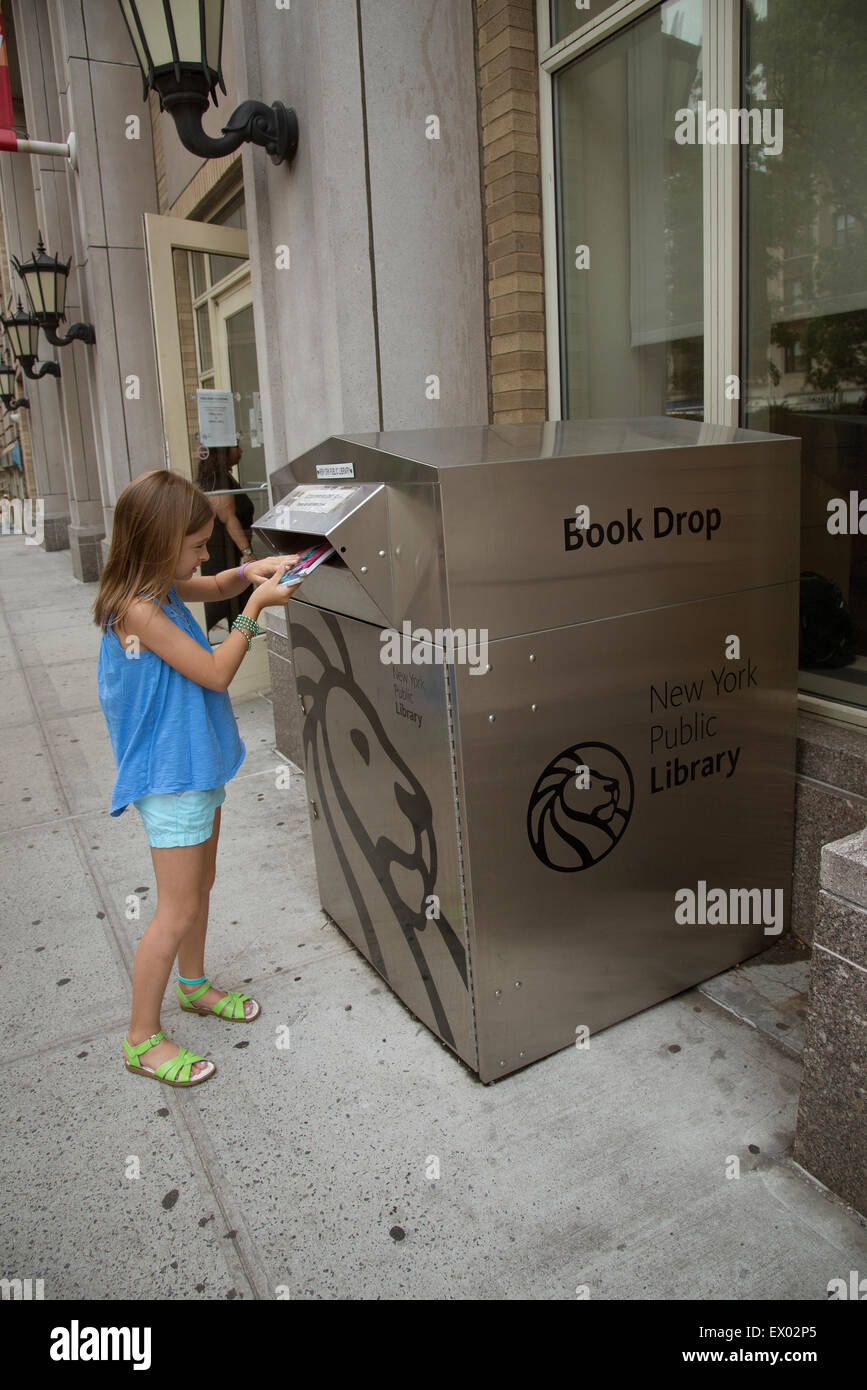 New York Public Library book drop young child returning the books she ...