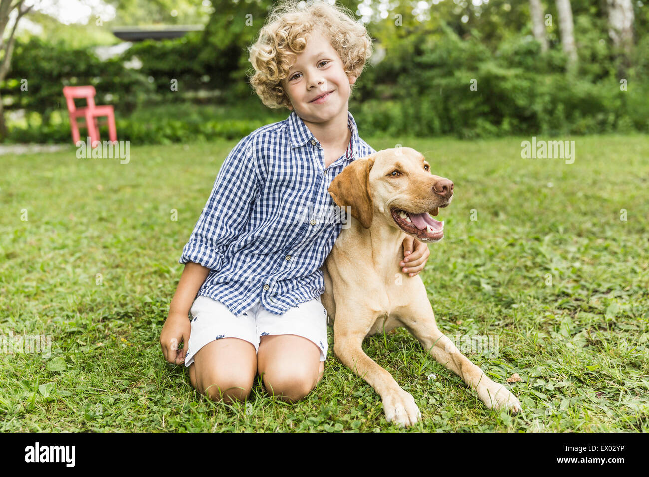 Boy dog garden hi-res stock photography and images - Alamy