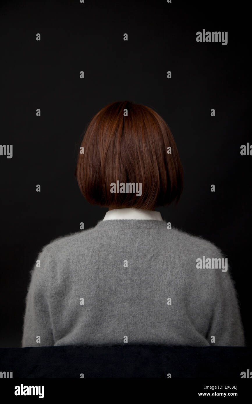 Rear view portrait of woman Stock Photo - Alamy