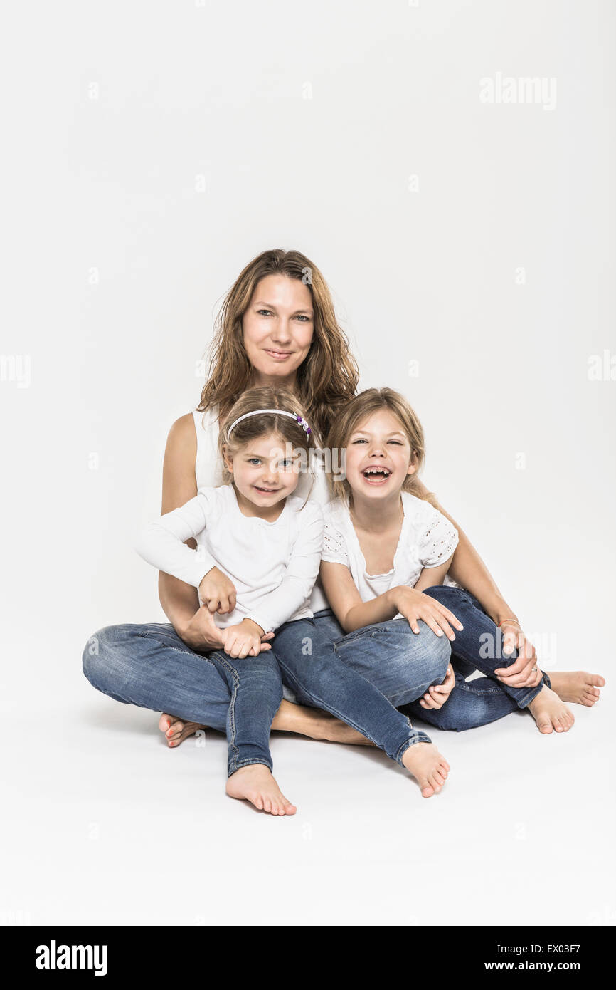 Mother and daughters Stock Photo - Alamy