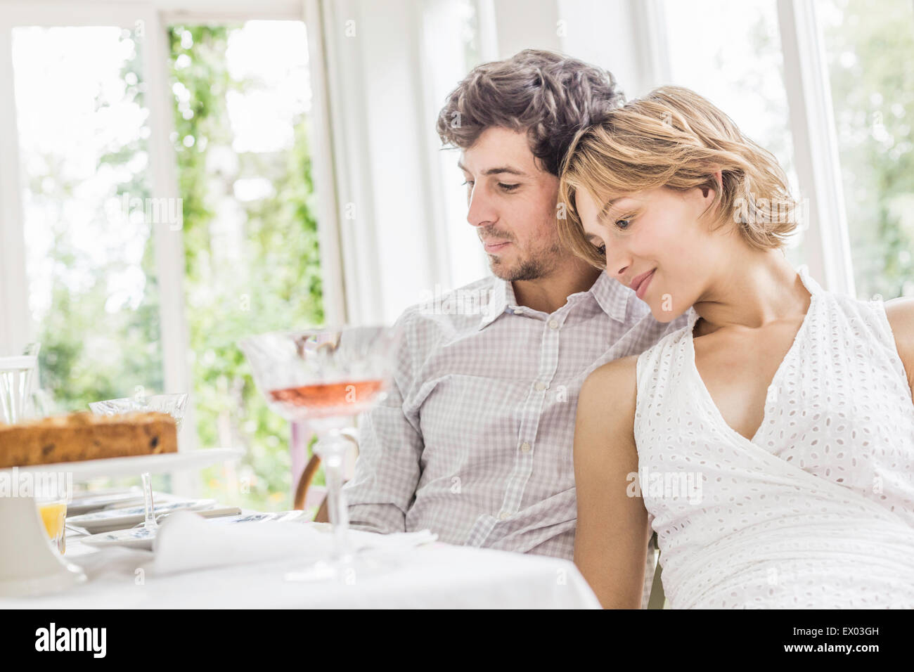 Couple Sitting Dining Table High Resolution Stock Photography and ...