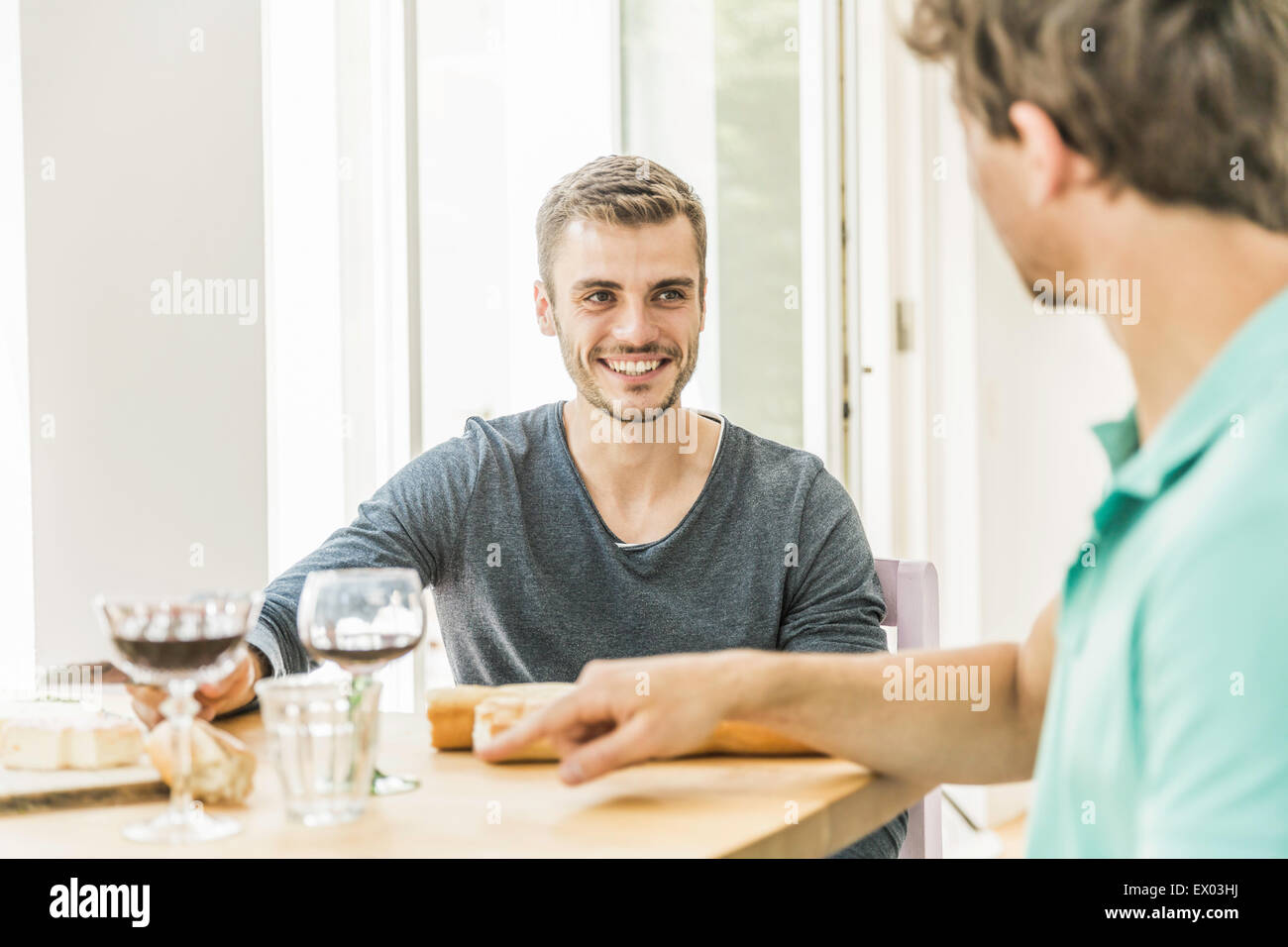 Two men talking in house hi-res stock photography and images - Alamy