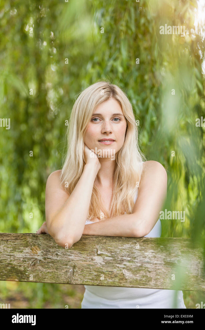 Mid adult woman in forest hi-res stock photography and images - Alamy