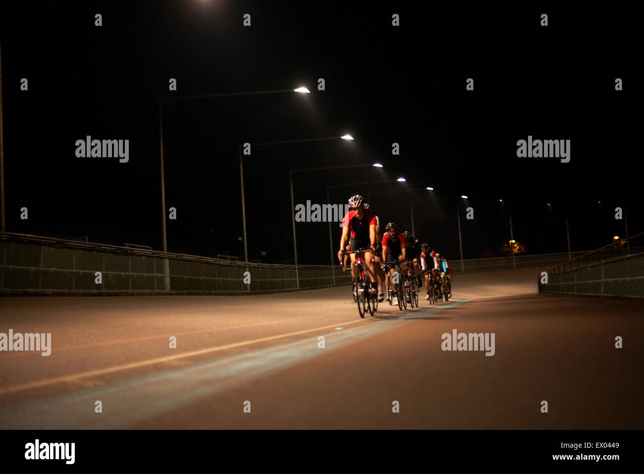 Cyclists cycling on track at velodrome, outdoors Stock Photo - Alamy