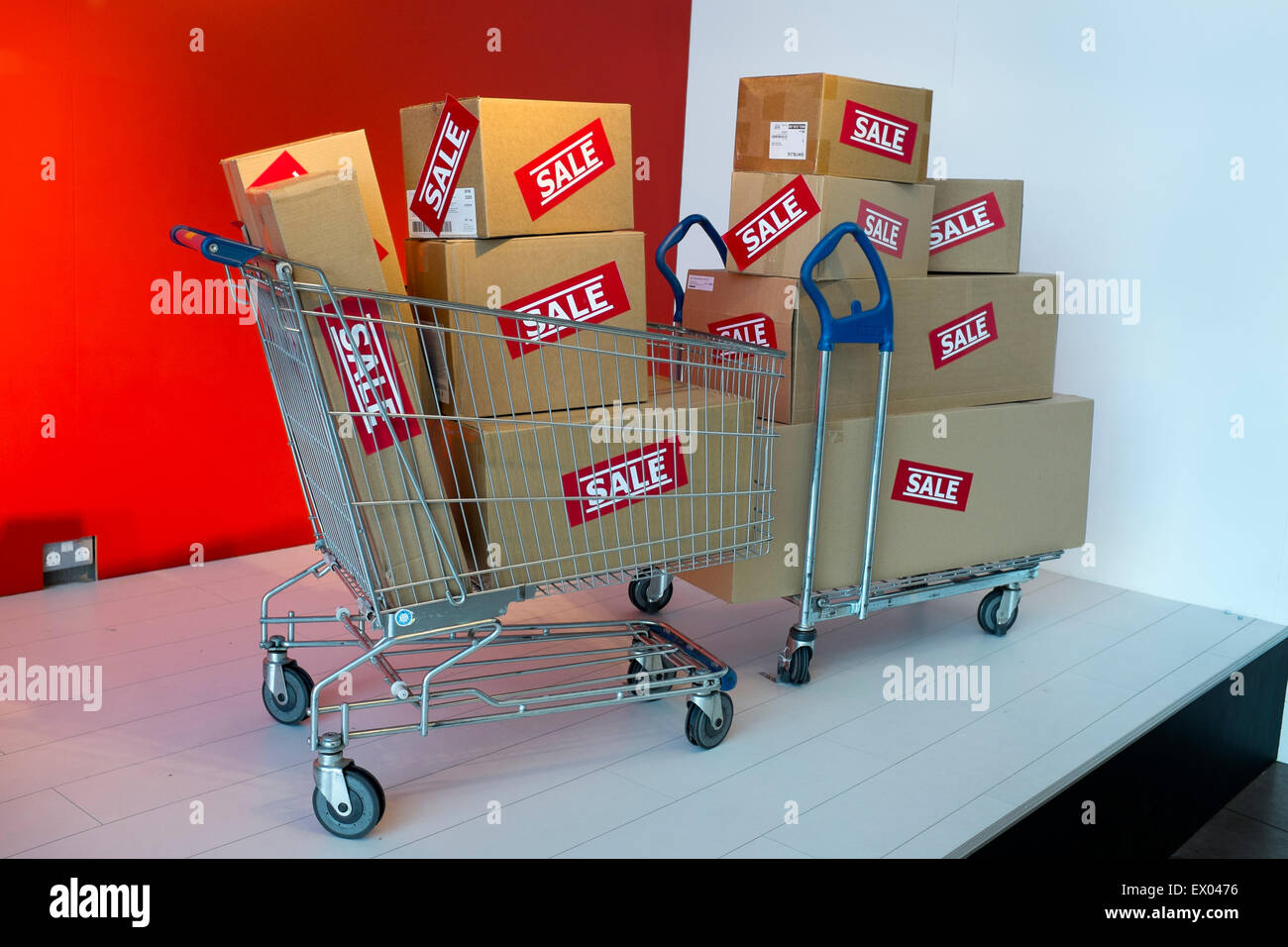 Sale Boxes and Shopping Trolleys Stock Photo - Alamy