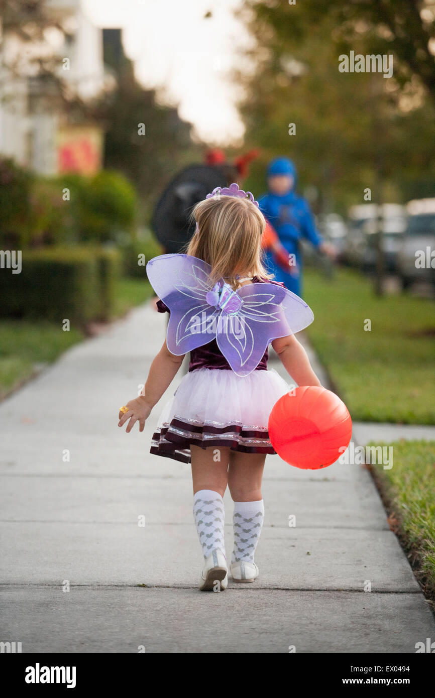 Children going trick or treating Stock Photo - Alamy