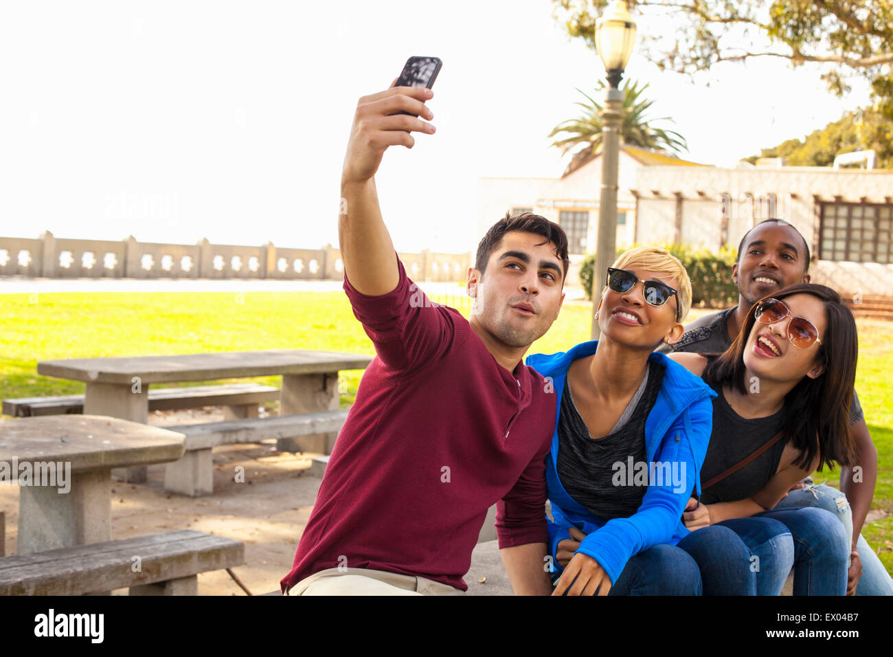 Group portrait friends sitting hi-res stock photography and images - Alamy